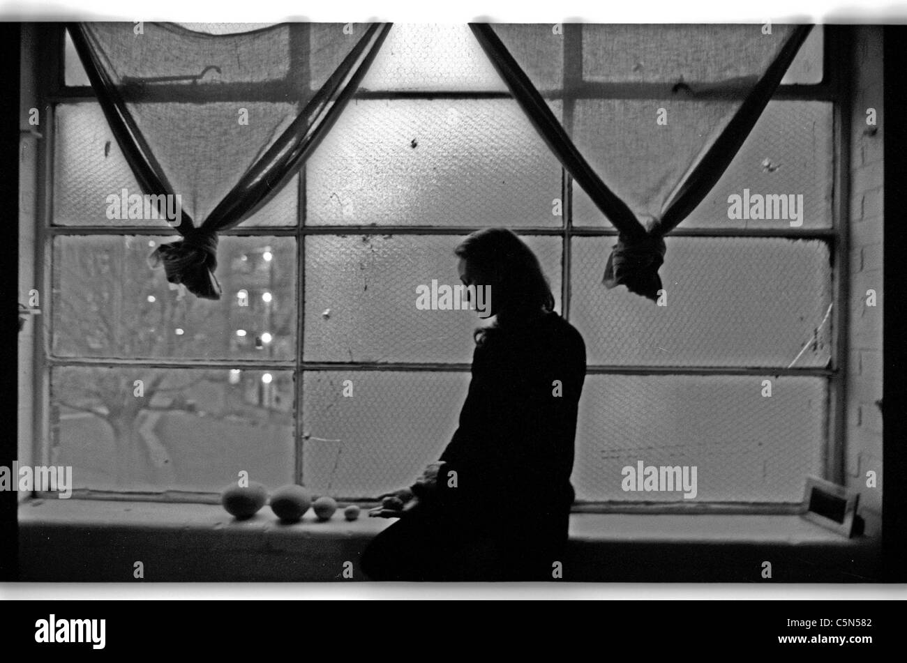 Girl at the window Stock Photo - Alamy