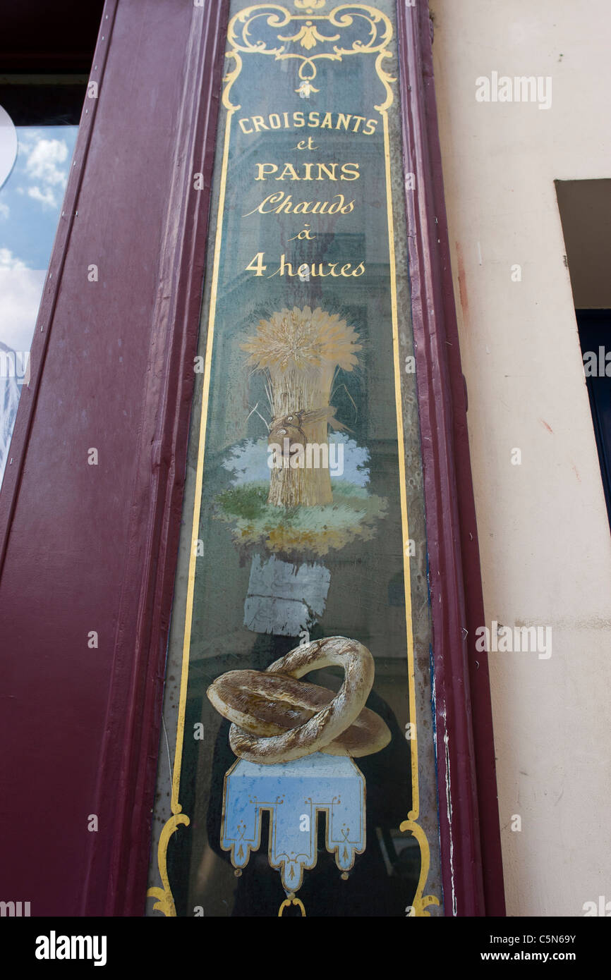 Old boulangerie sign telling customer of warm bread and croissants at 4 ...