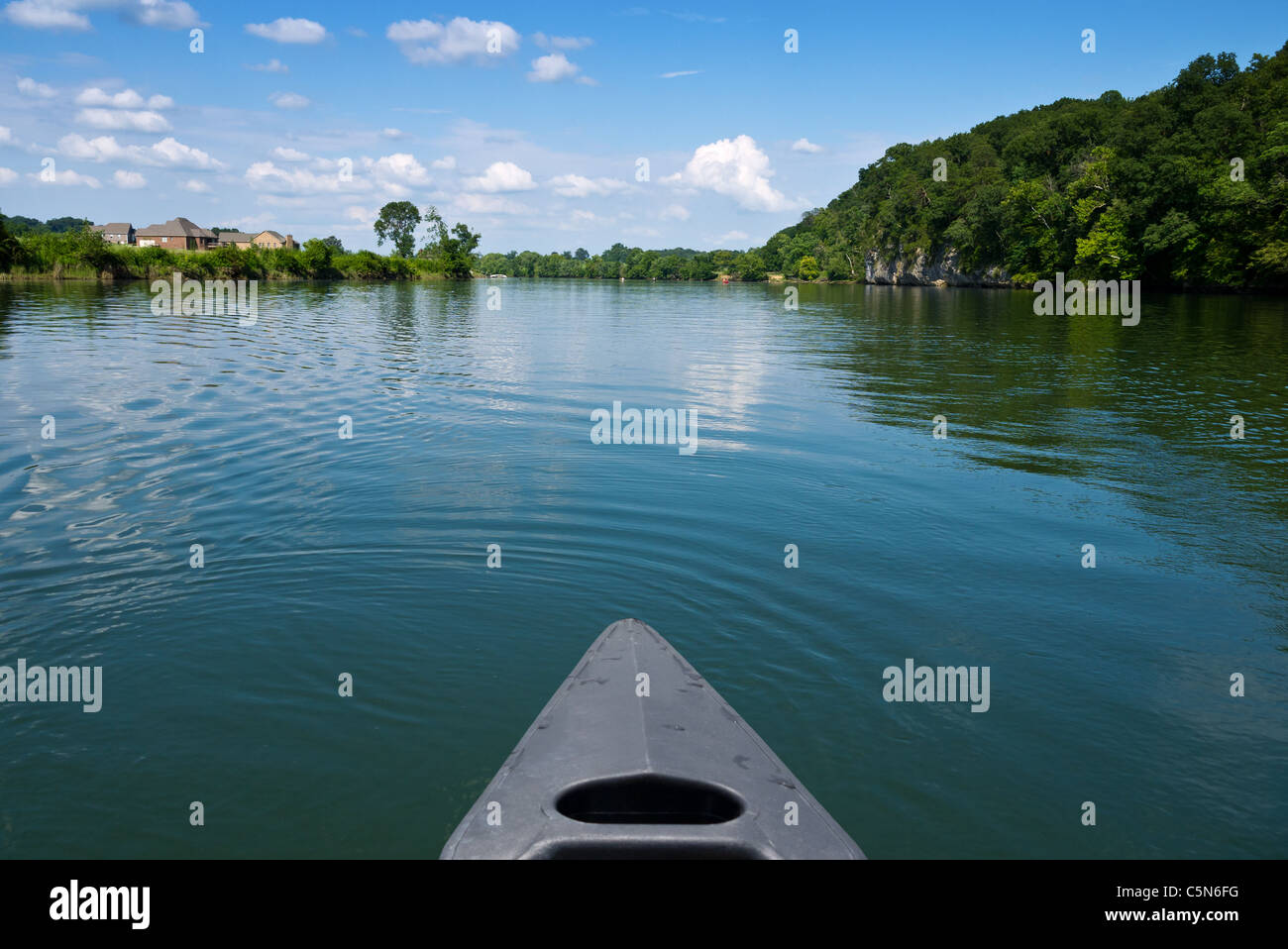 Bow of canoe floating down the French Broad River, Knoxville, Tennessee ...