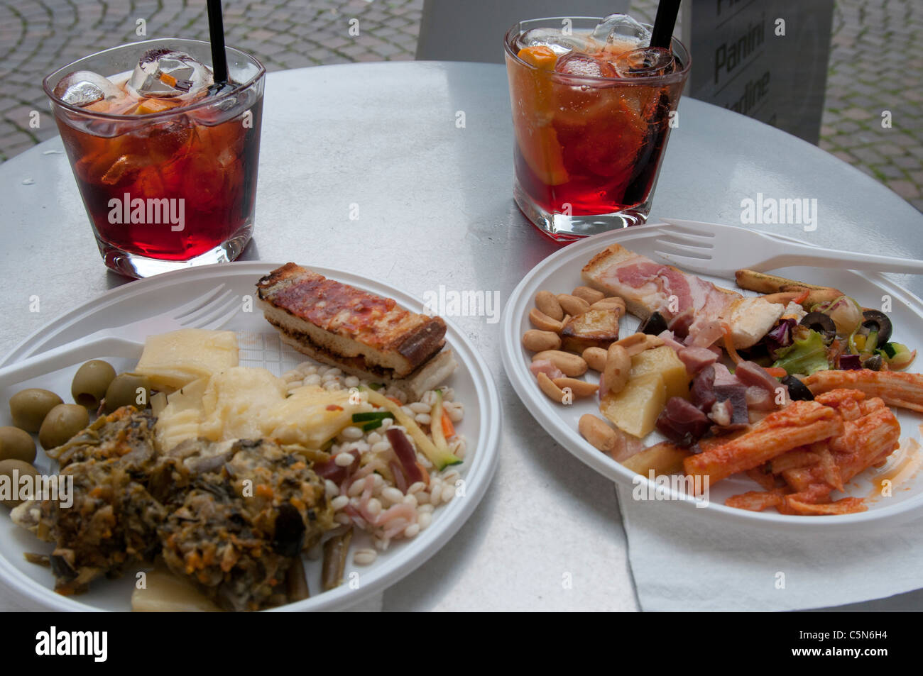Aperitivo - aperitifs served with snacks at a bar in Como, Italy Stock ...