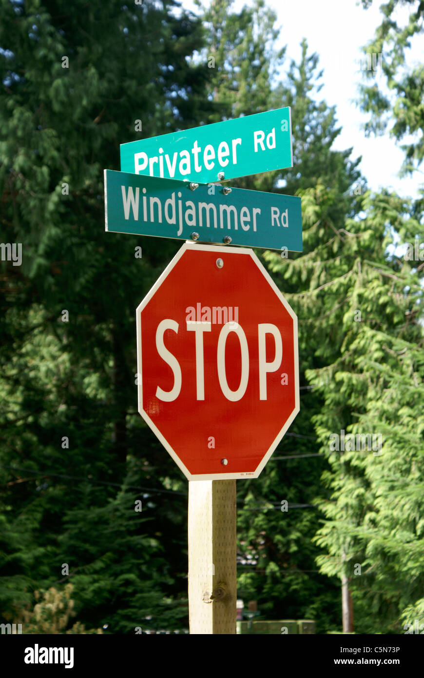 Road sign and stop sign on Bowen Island, British Columbia, Canada Stock ...