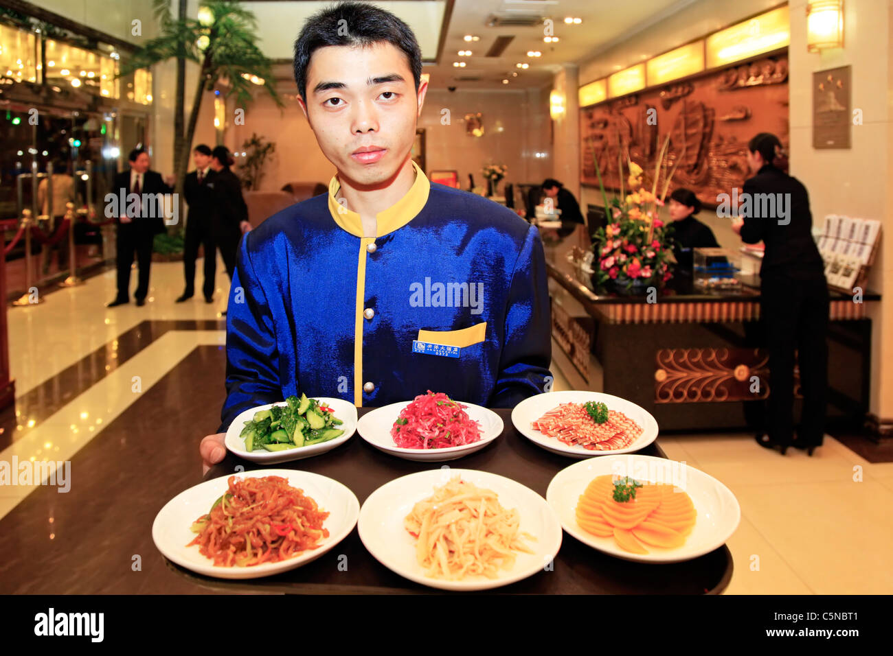 Chinese waiter, Hefei, Anhui province, China Stock Photo - Alamy