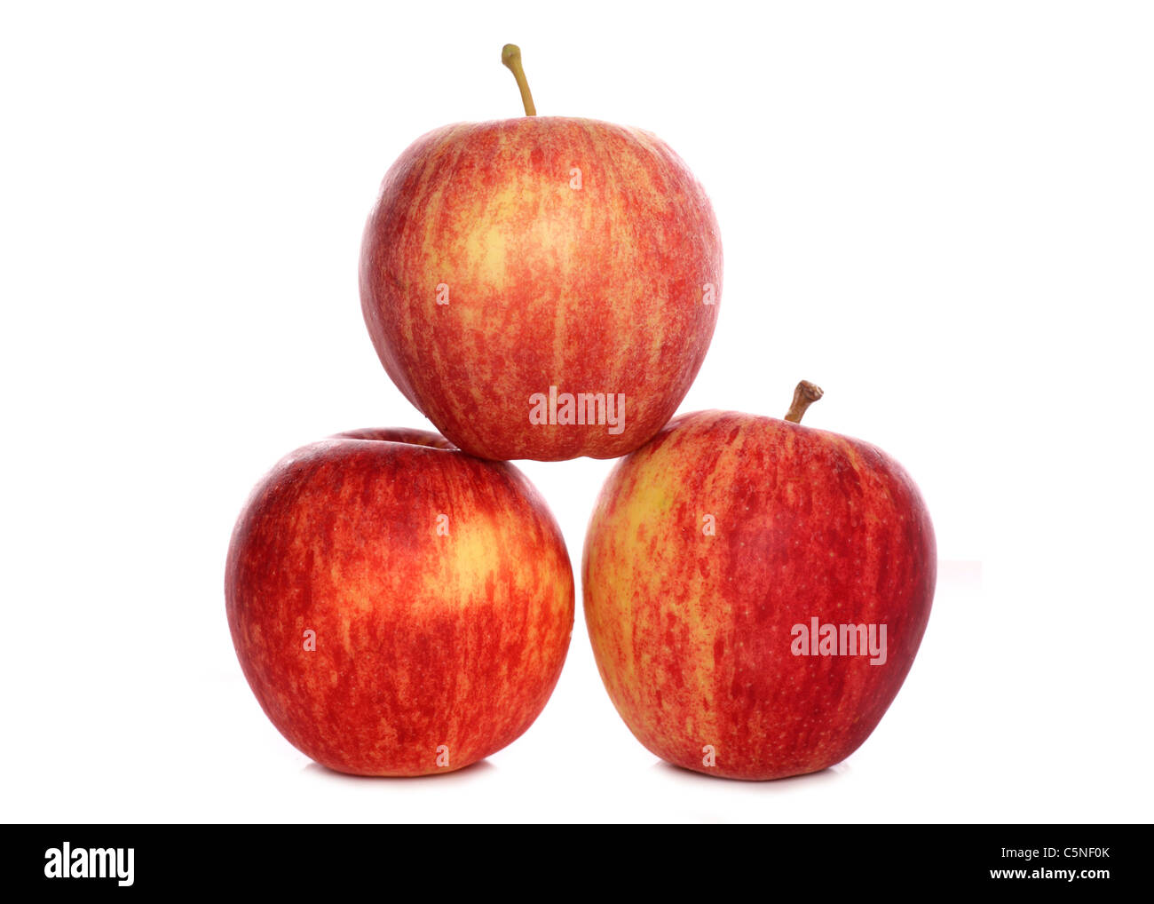 three red apples isolated on white background Stock Photo - Alamy
