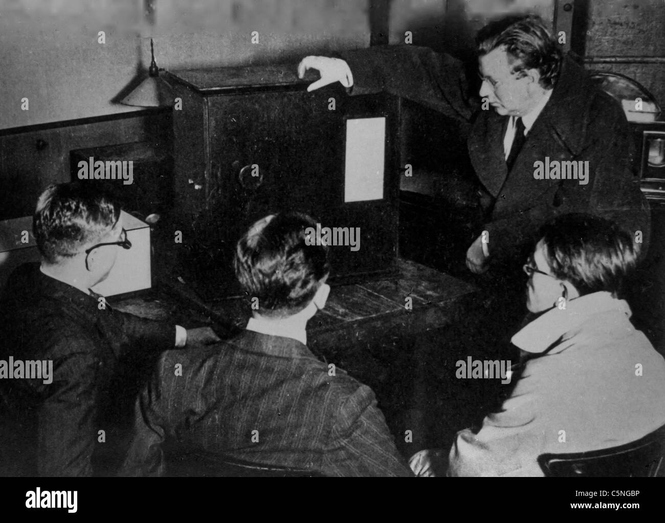 the inventor of television John Logie Baird in a public demonstration of his apparatus, 1925 ...