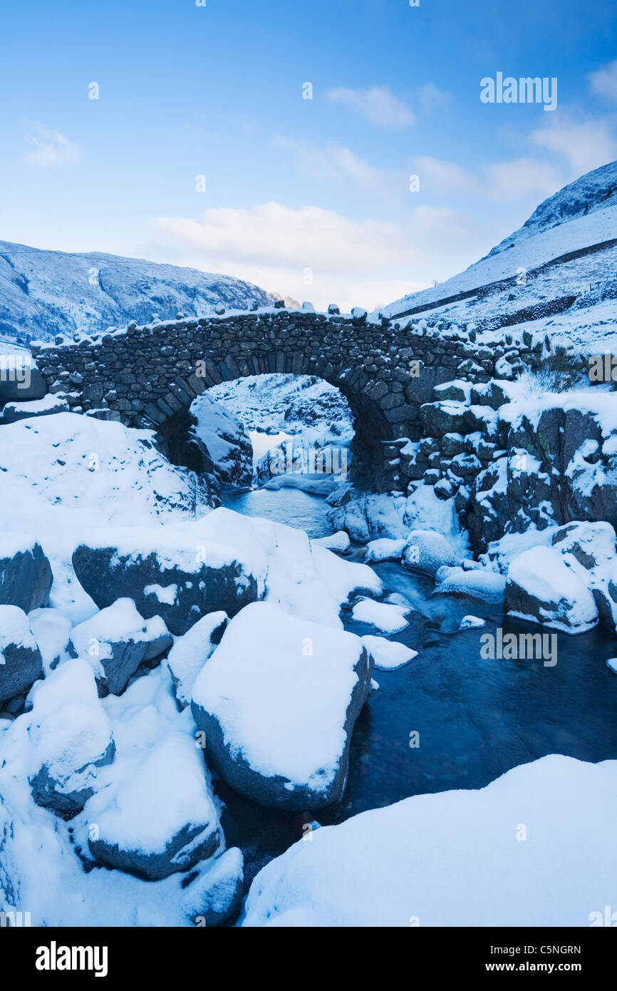 Stockley Bridge, a traditional packhorse bridge over Grains Gill near ...