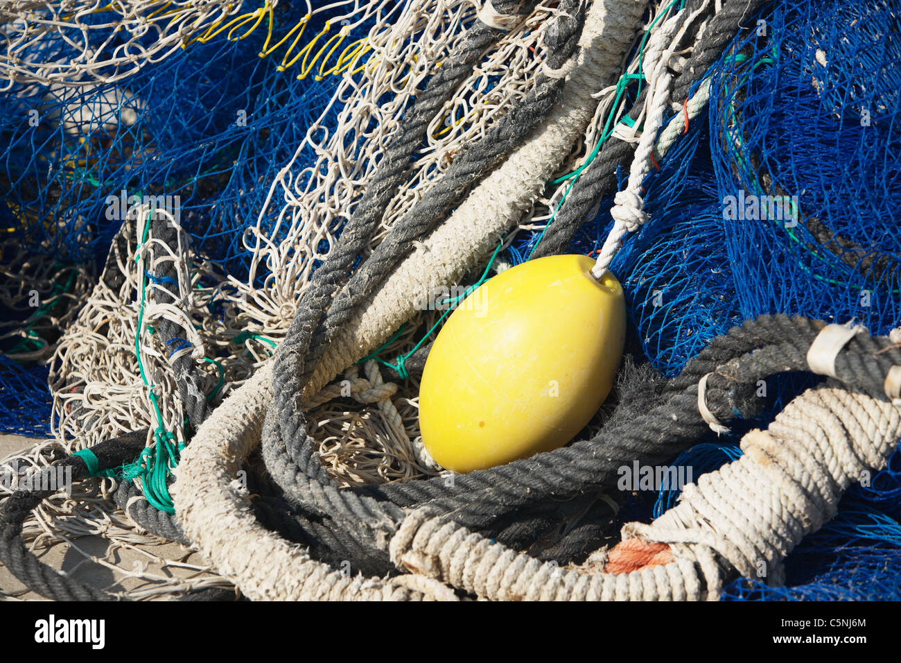 Close-up commercial fishing netting and ropes Stock Photo - Alamy