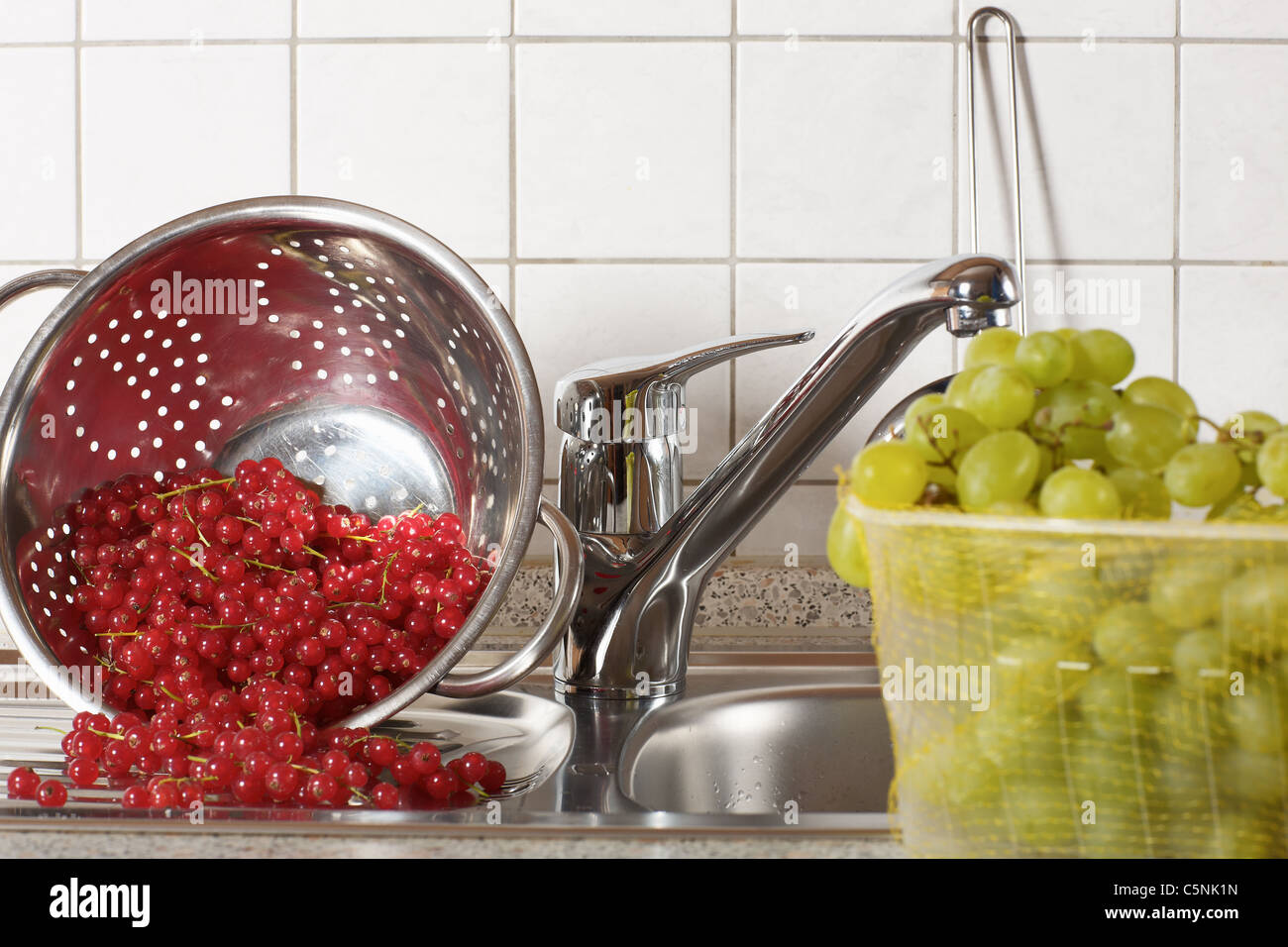 Fruit washed in a strainer hi-res stock photography and images - Alamy