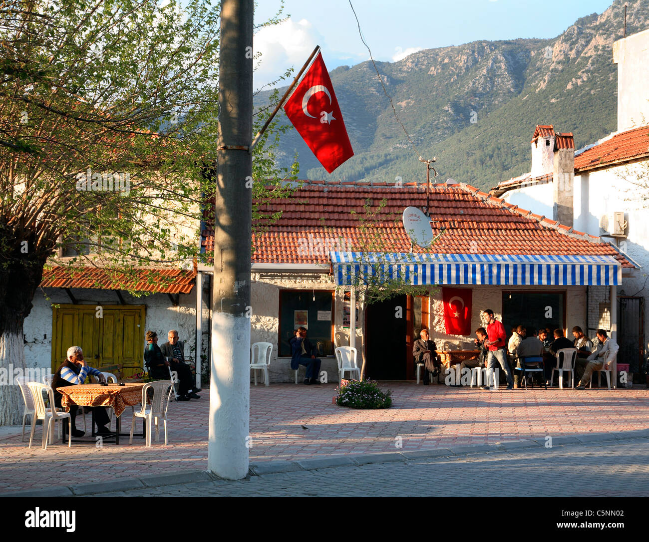 Turkish village scene with cafe Stock Photo - Alamy