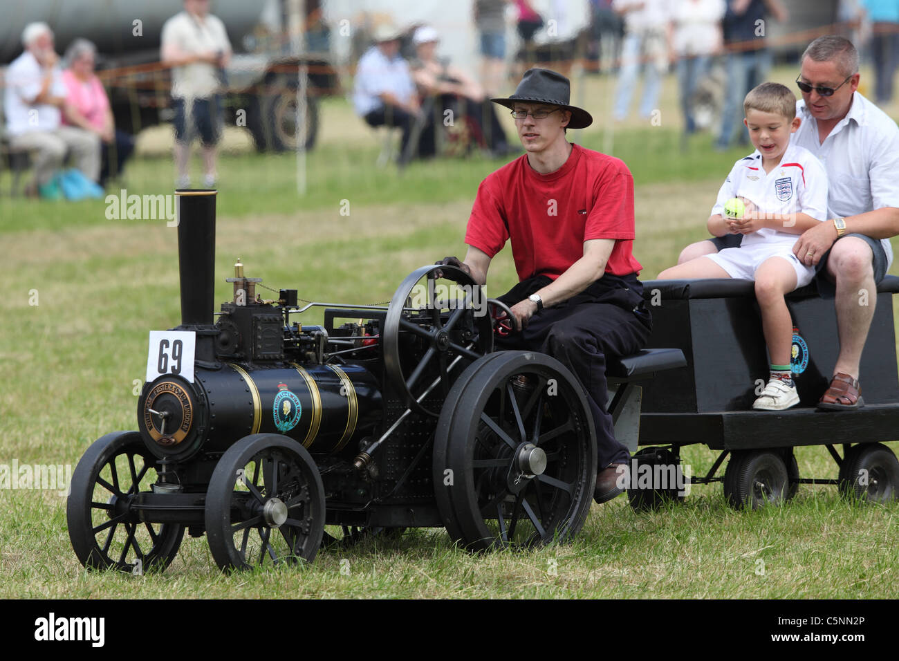 A scale model of steam traction engine in a spoon and ball race Stock ...