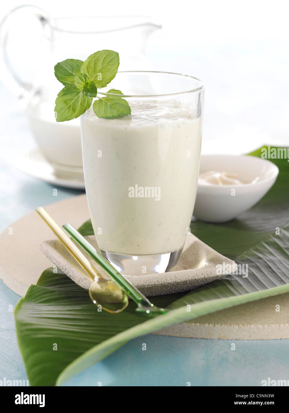 Beauty shake with buttermilk and banana Stock Photo - Alamy