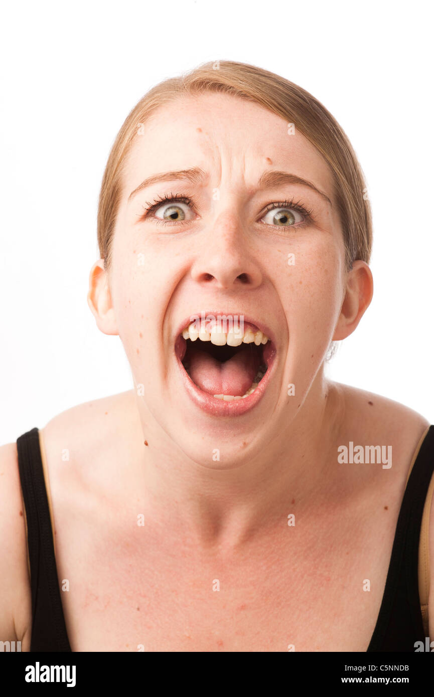 a young caucasian woman shouting, yelling, screaming Stock Photo - Alamy