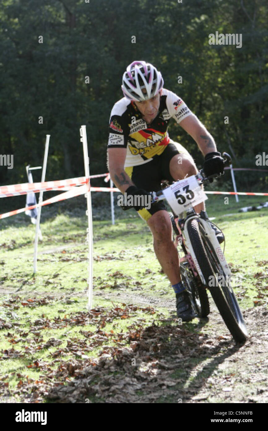 A competitor approaches the finish line in a cross country mountain ...