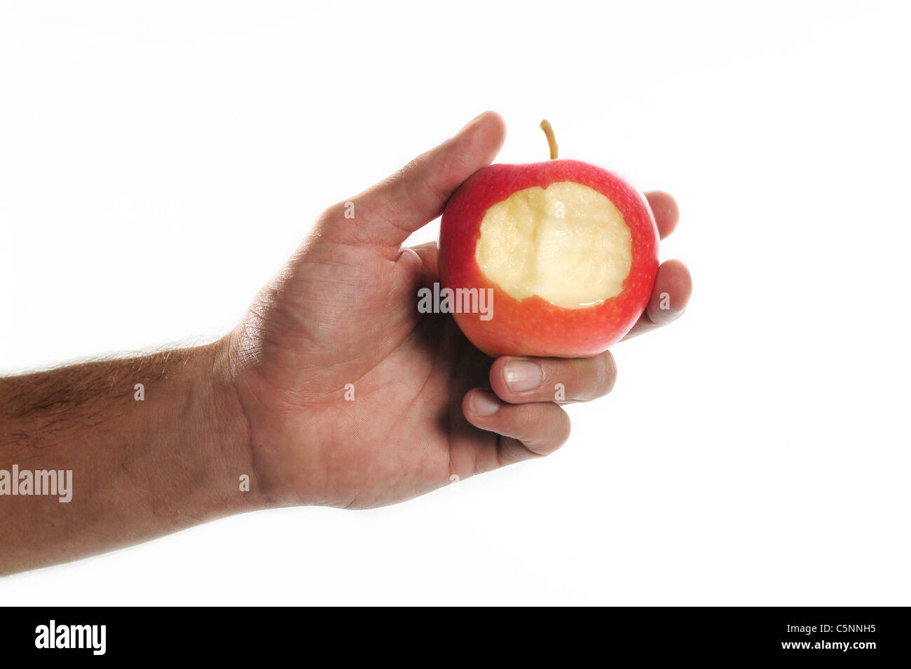 Male hand holding an apple Stock Photo - Alamy