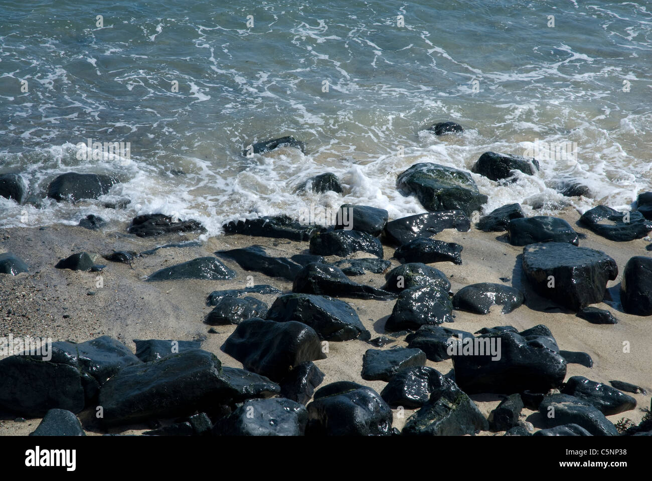 Washing over rocks hi-res stock photography and images - Alamy