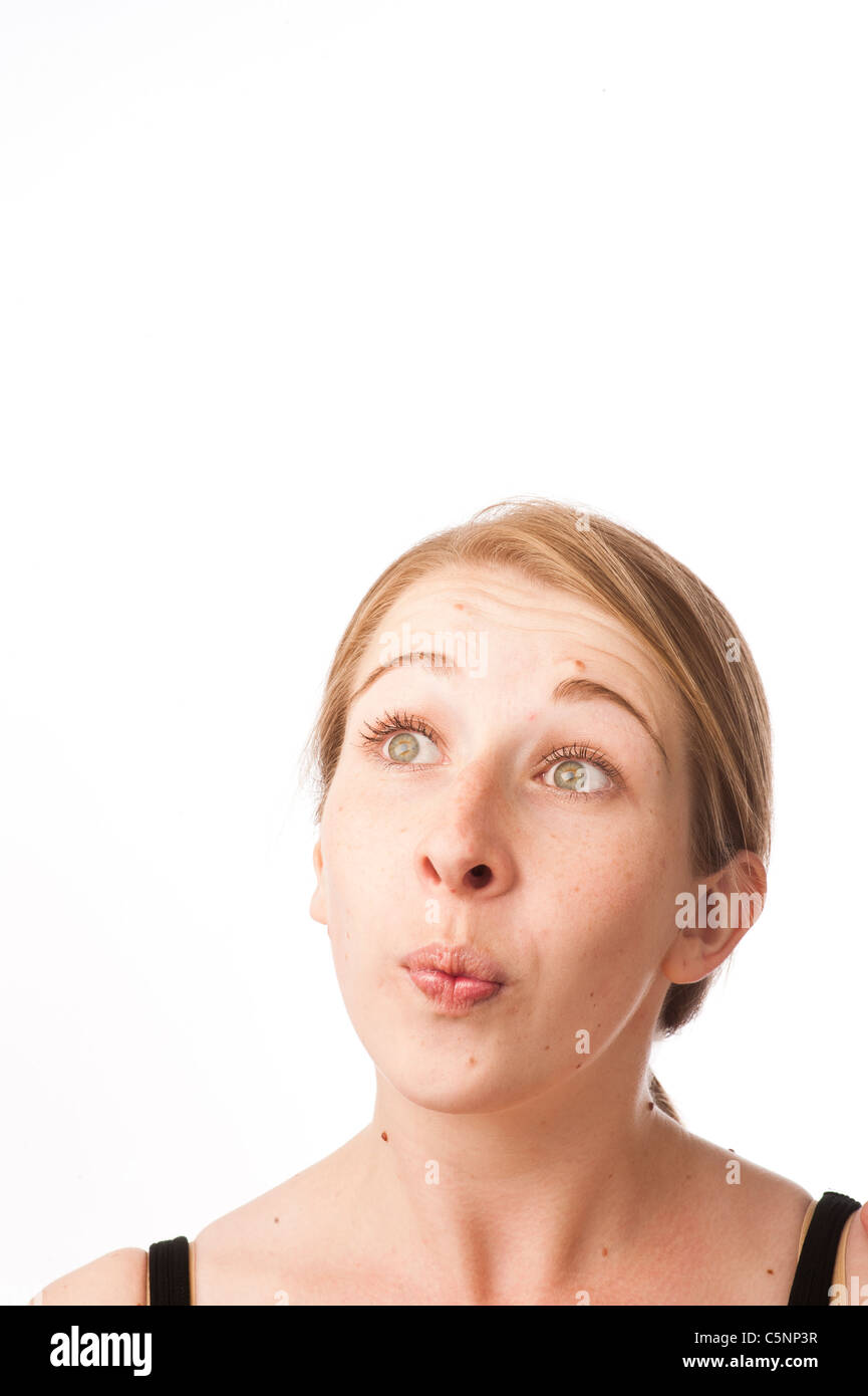 a young caucasian woman looking confused Stock Photo - Alamy