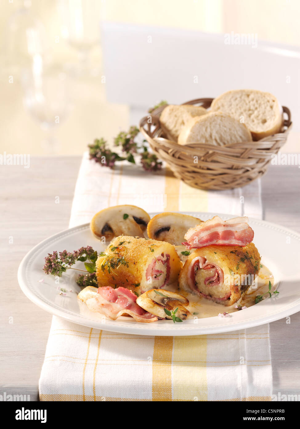 Dumpling rolls with bacon Stock Photo - Alamy