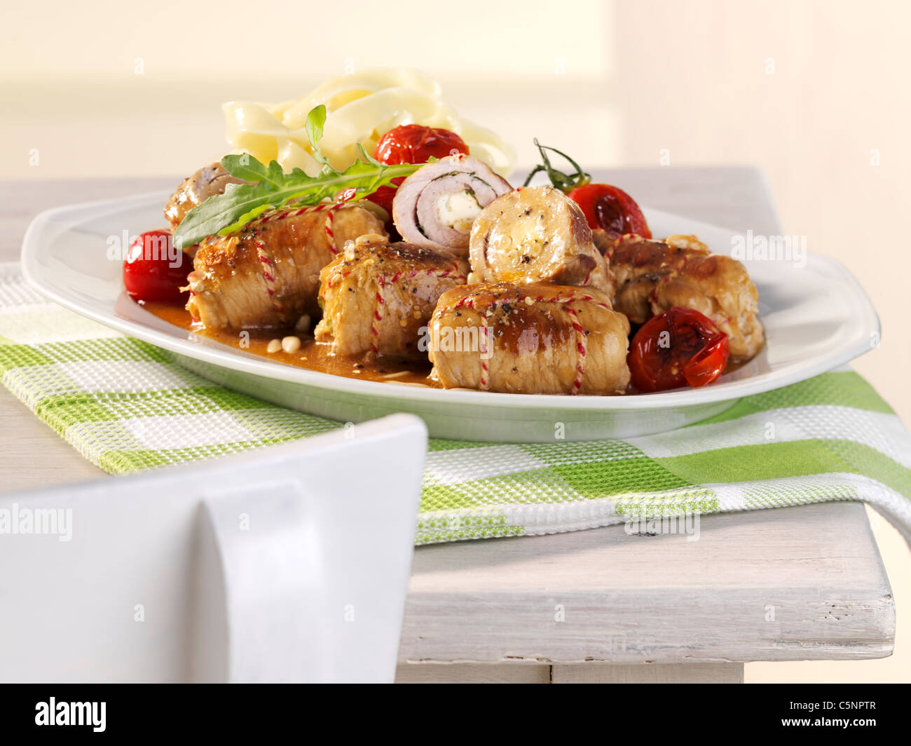 Meat rolls with rocket and sheep's cheese Stock Photo - Alamy