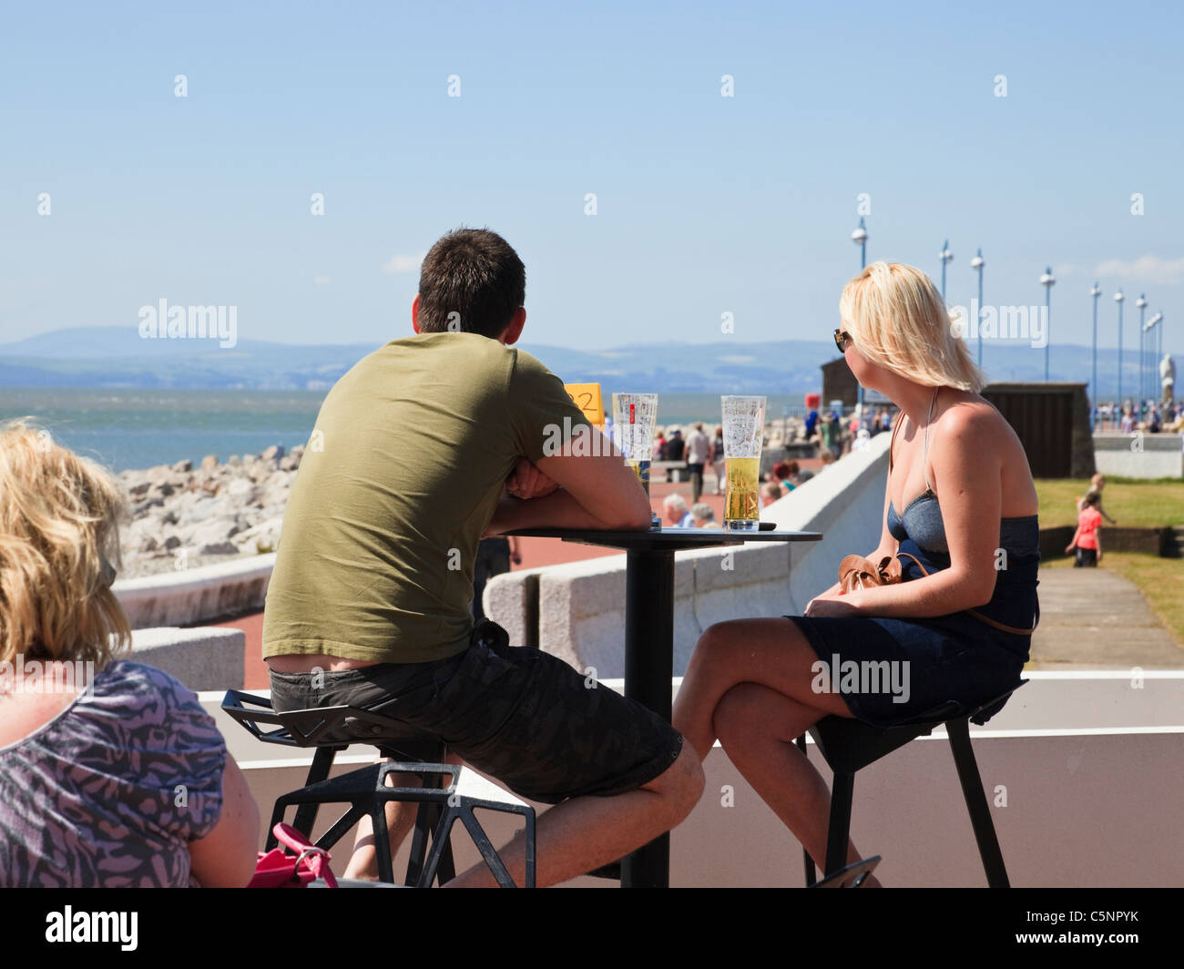 People Sat Outside Cafe Stock Photos & People Sat Outside Cafe Stock ...