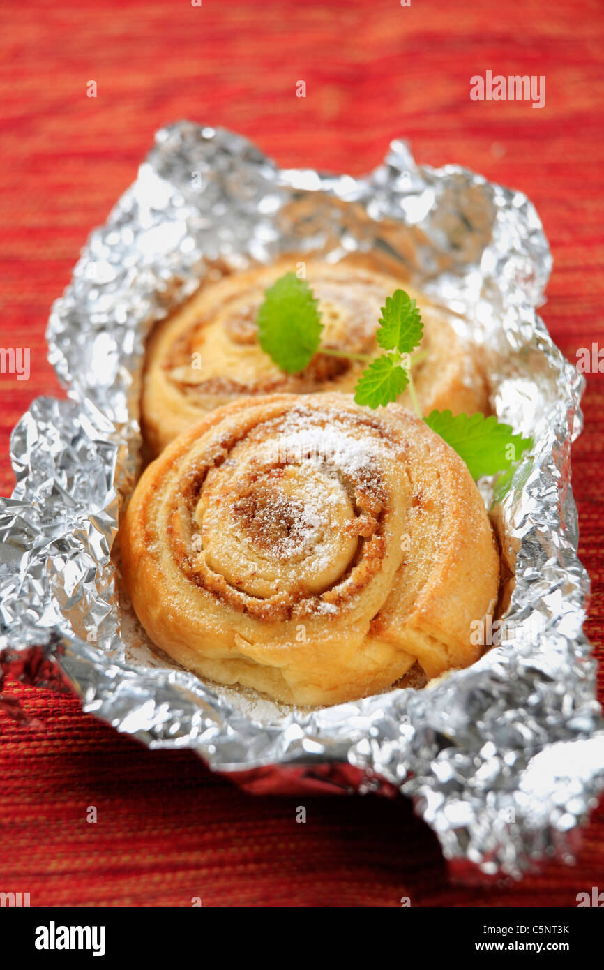 Danish pastries with nut filling in tinfoil Stock Photo - Alamy