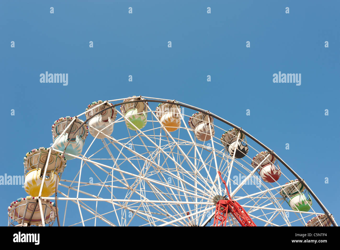 Ferris wheel attraction spinning against hi-res stock photography and ...