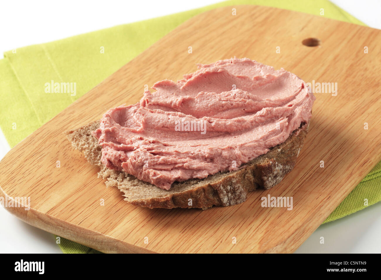 Slice of bread and smooth liver pate Stock Photo - Alamy