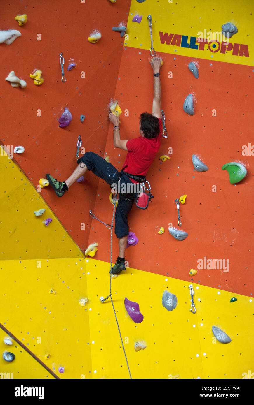 INDOOR PERSON IN ROCK CLIMBING Stock Photo - Alamy