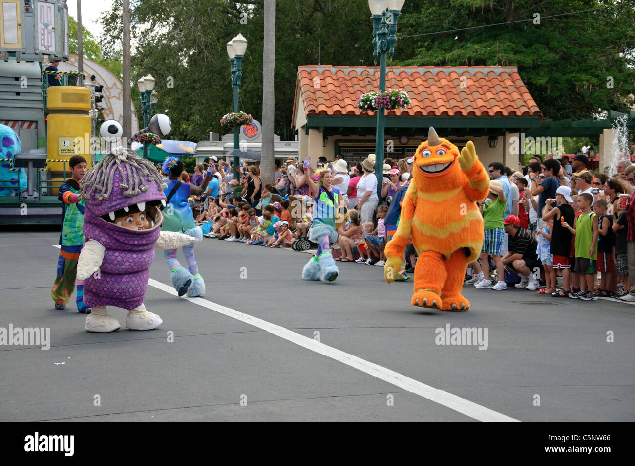George Sanderson and boo in the disney pixar countdown to fun parade in ...