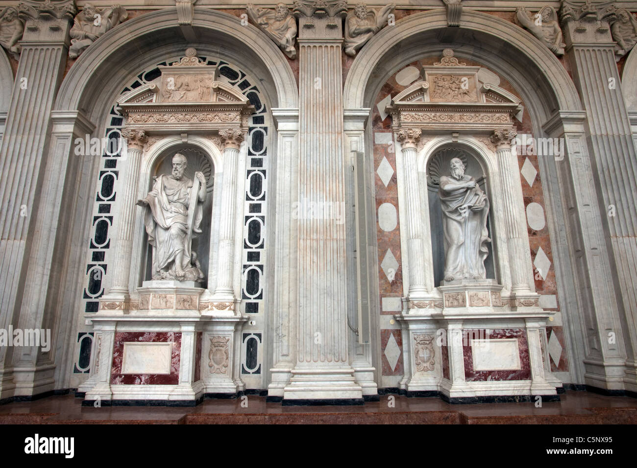 Interior of Messina, Sicily Cathedral with relief sculpture, arches ...