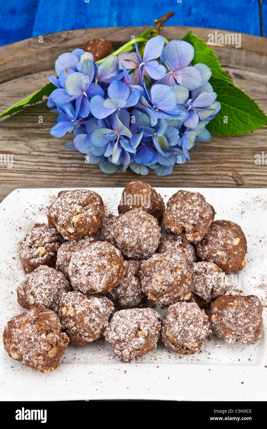 Chocolate cakes with powdered sugar and nuts Stock Photo - Alamy
