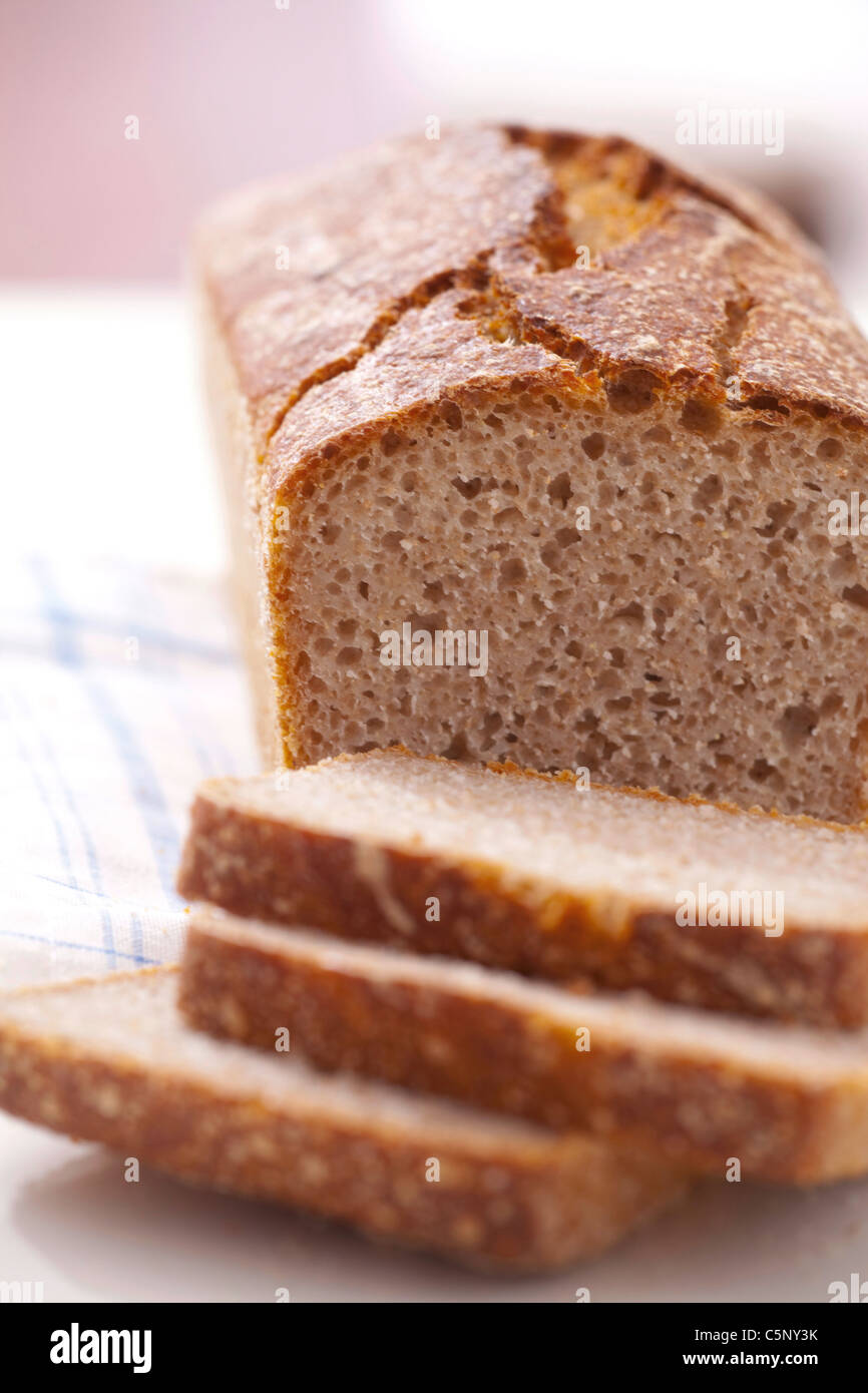 Whole wheat bread cut into slices Stock Photo - Alamy