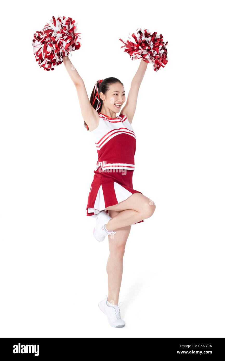 Cheerleader In Action Pom Poms High Resolution Stock Photography and ...