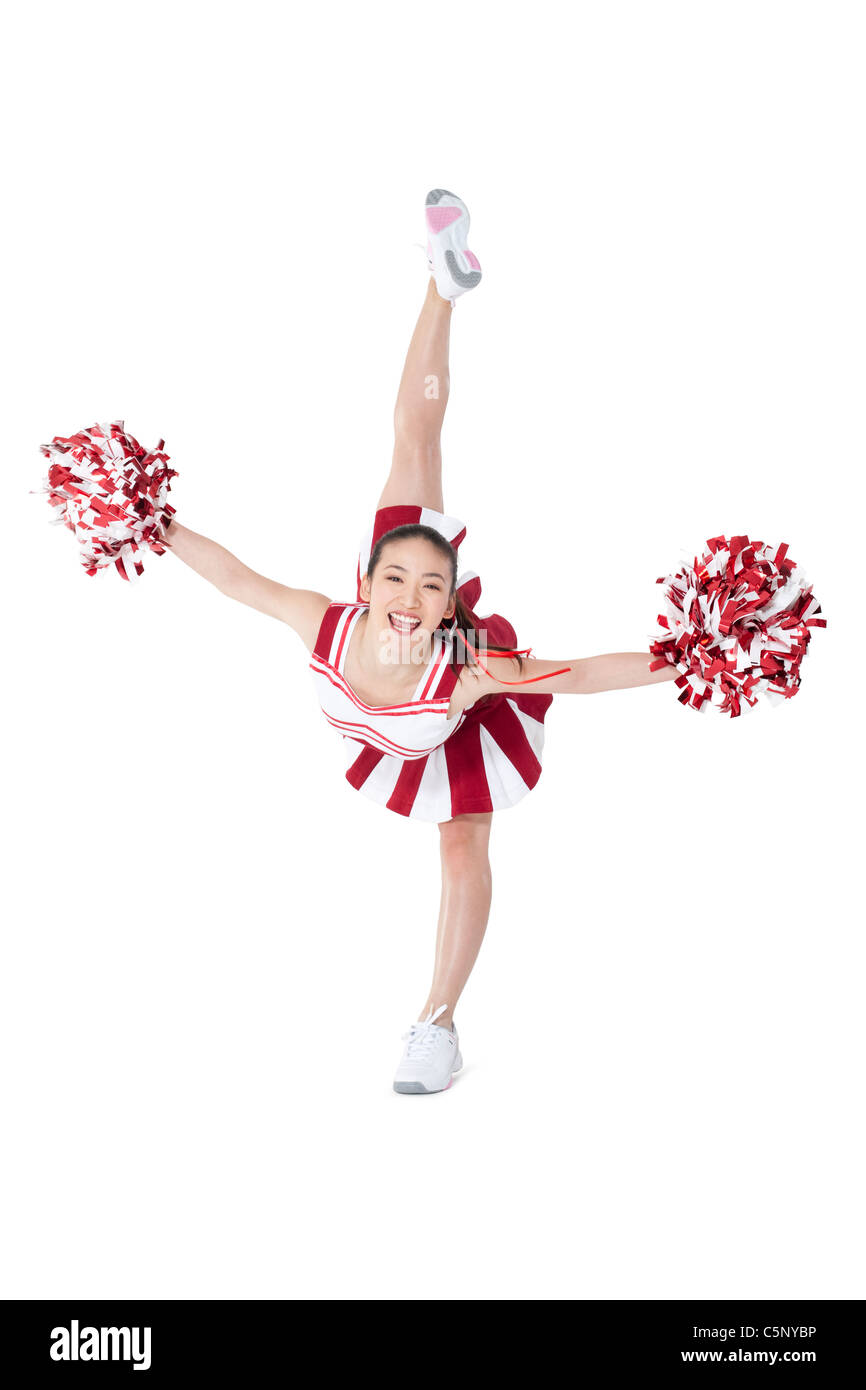 Cheerleader in action pom poms hi-res stock photography and images - Alamy