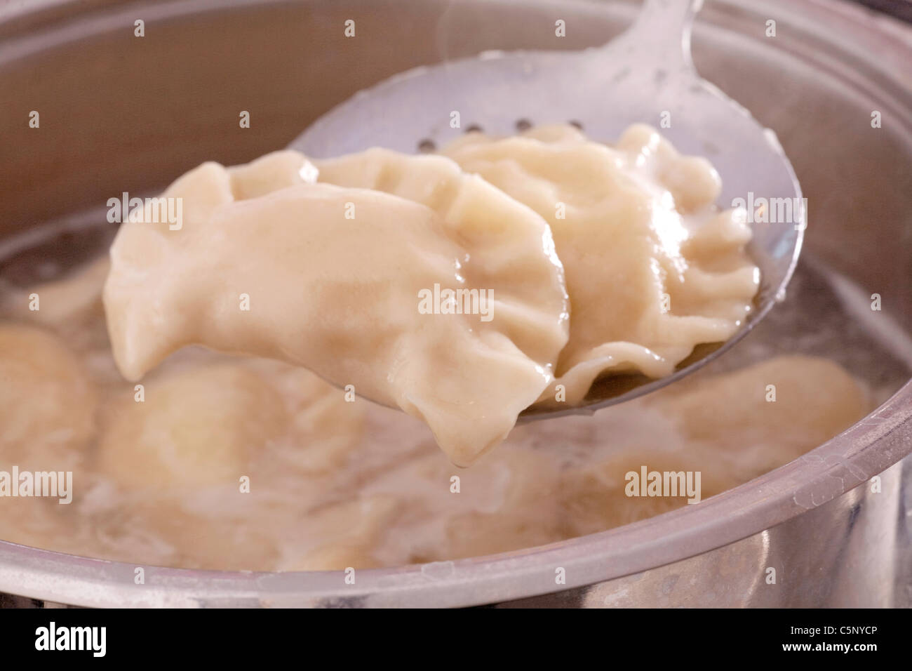 Woman Eating Pierogies High Resolution Stock Photography and Images - Alamy