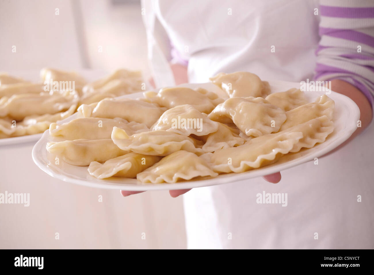 Woman eating pierogies hi-res stock photography and images - Alamy