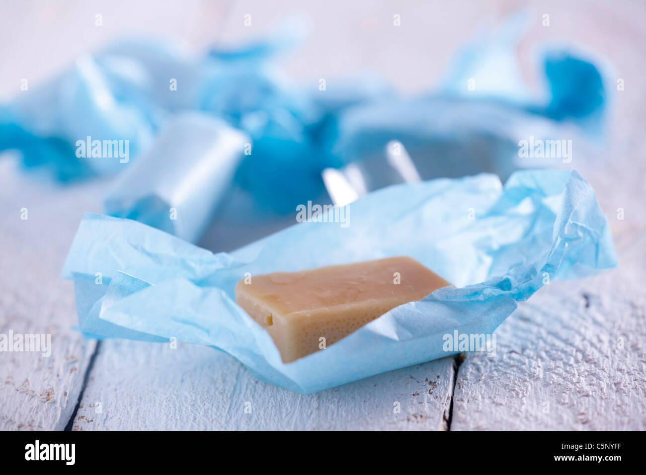 Home made fudge covered with paper Stock Photo - Alamy
