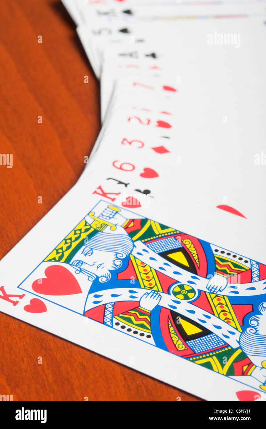playing cards in a row Stock Photo - Alamy