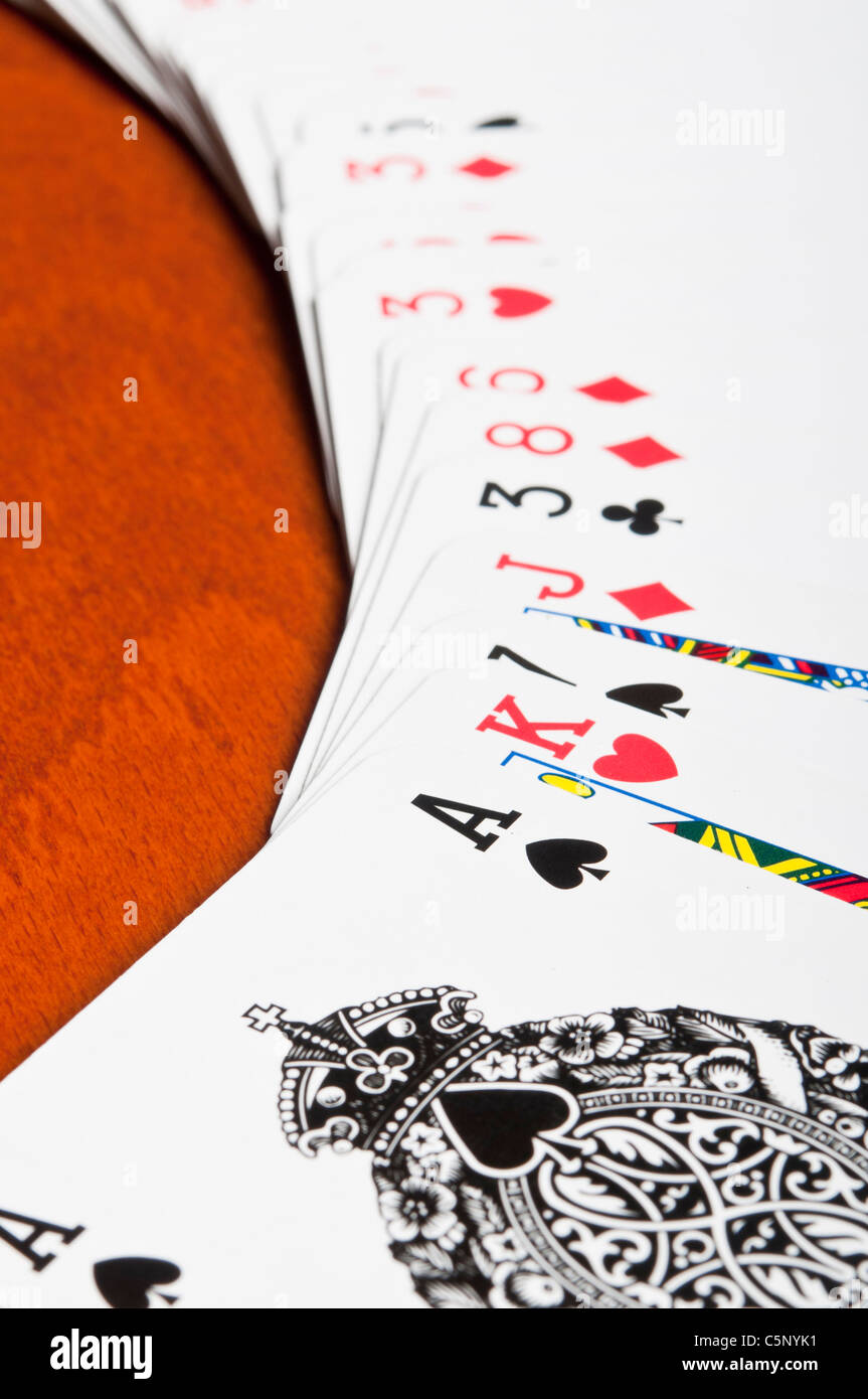 playing cards in a row Stock Photo - Alamy