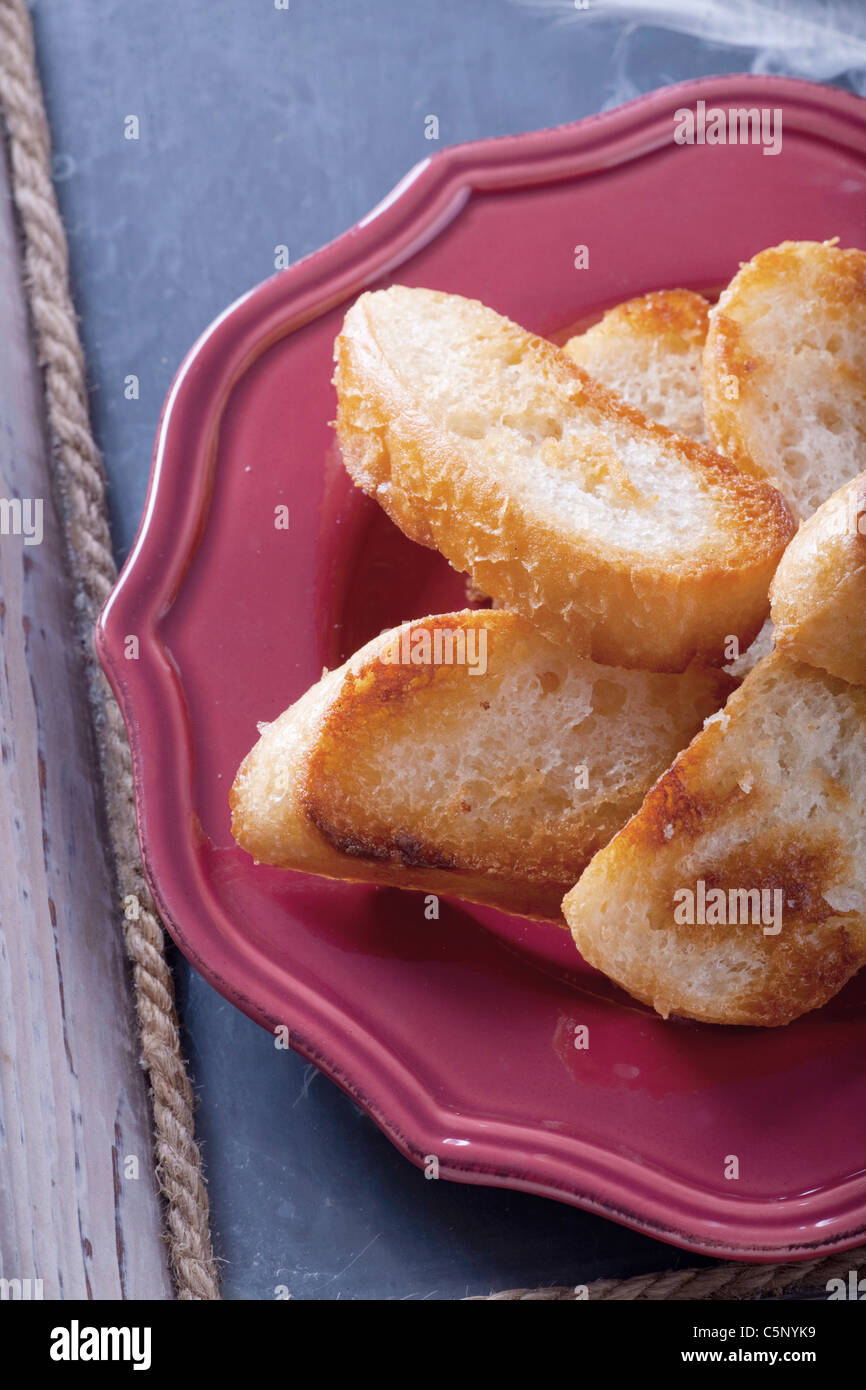 Toasted breadrolls with garlic Stock Photo - Alamy