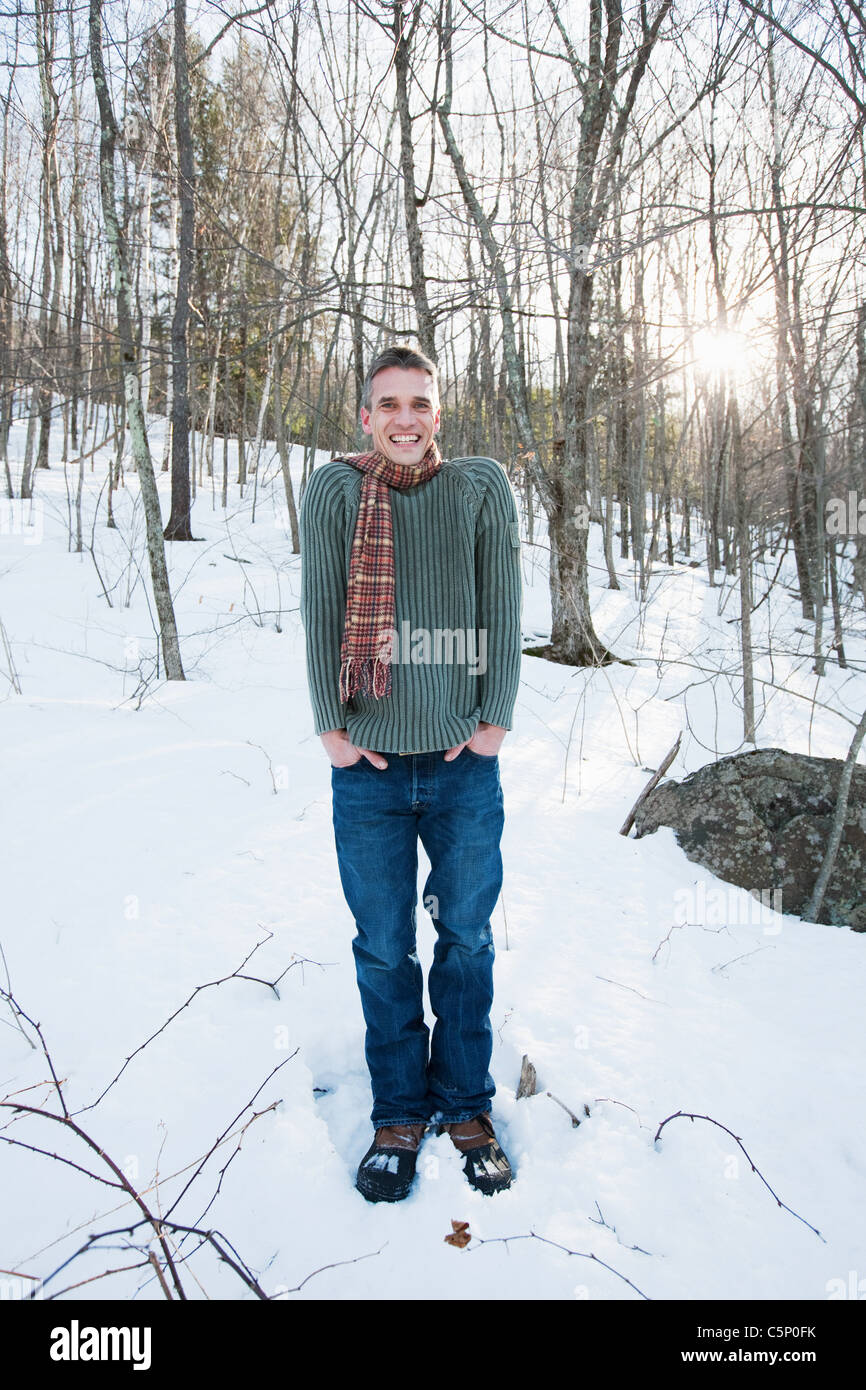 Man standing in snow, portrait Stock Photo - Alamy