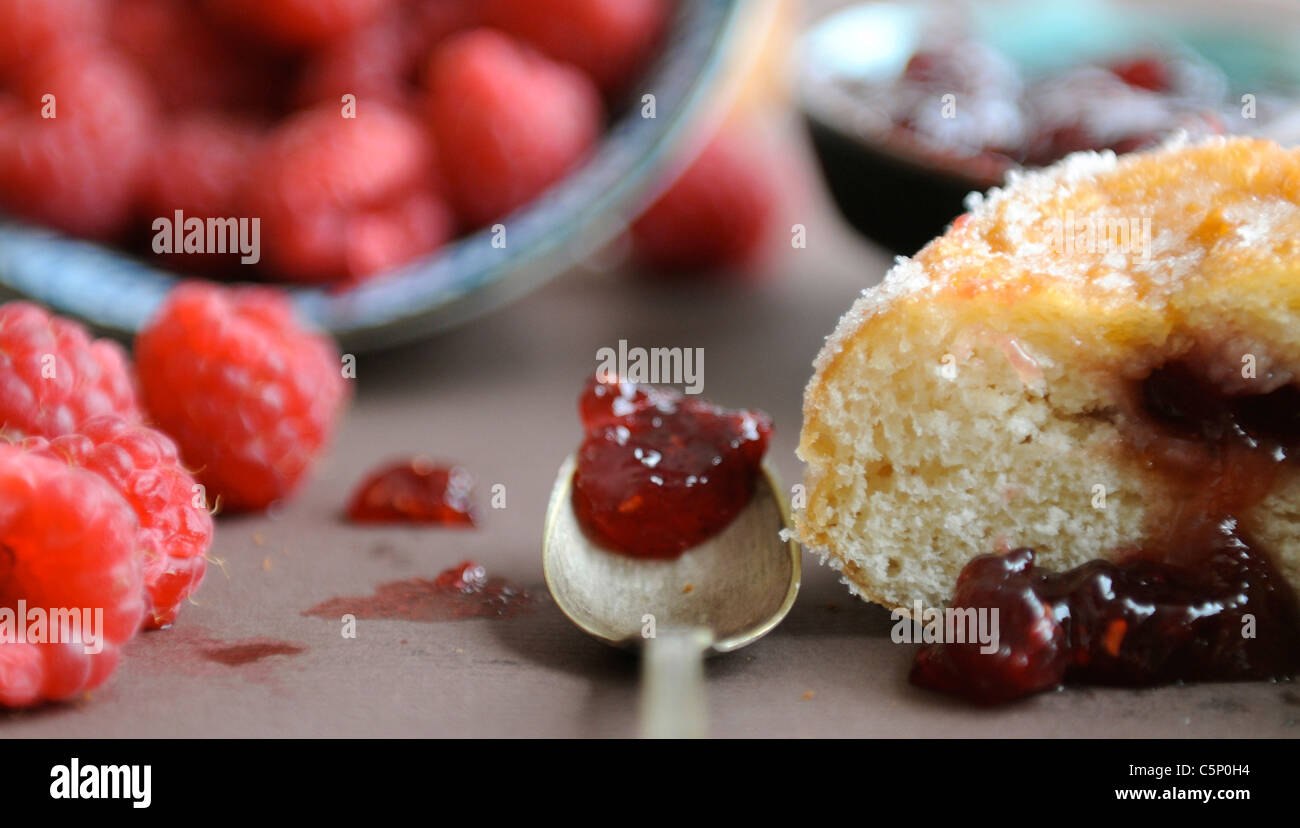 Raspberry jam doughnut Stock Photo - Alamy
