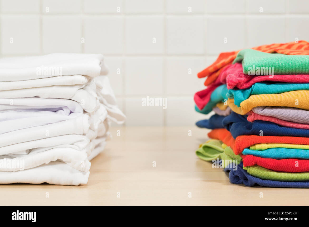 Piles of clean laundry Stock Photo - Alamy