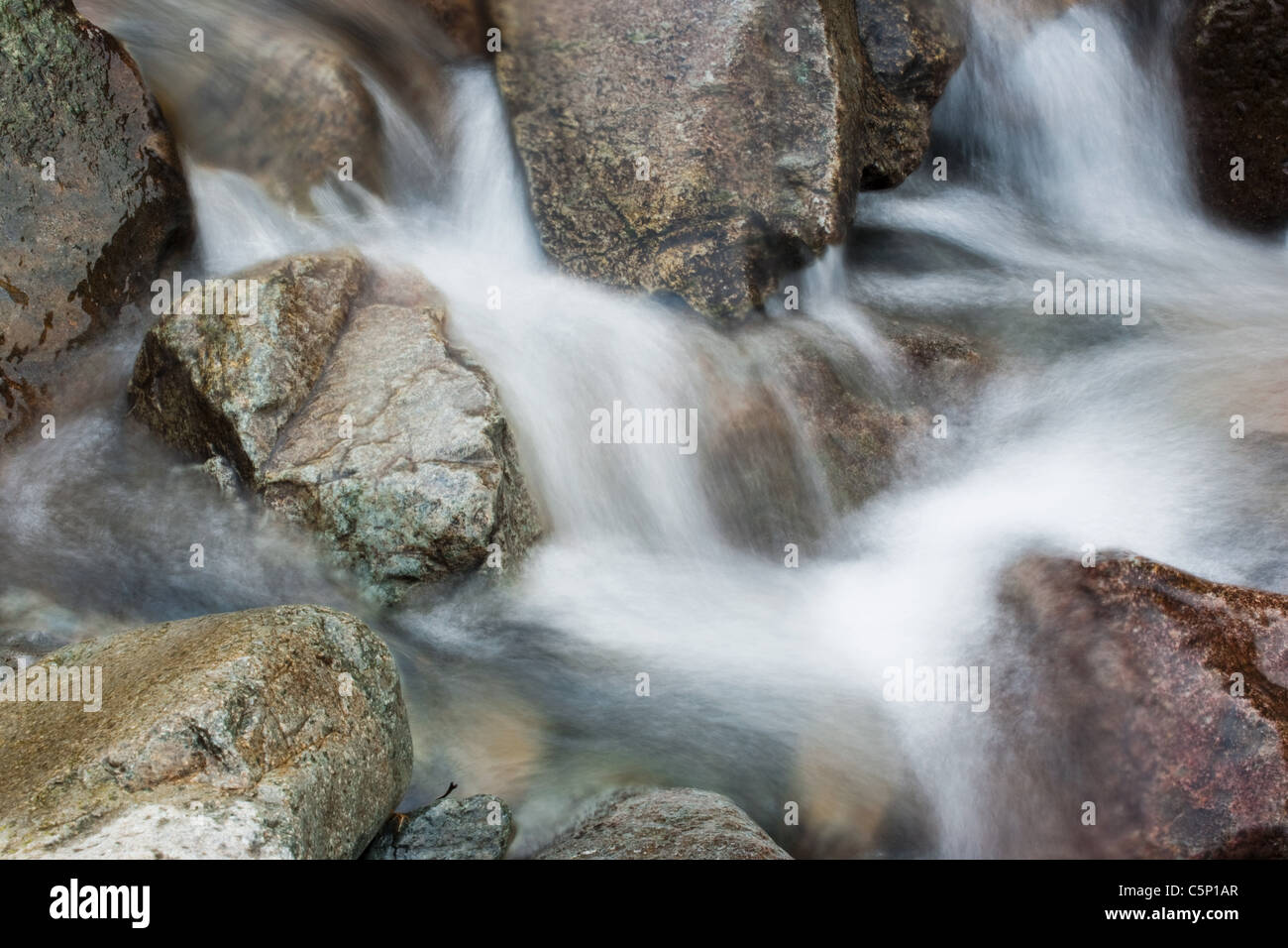 Water flowing over rocks Stock Photo - Alamy