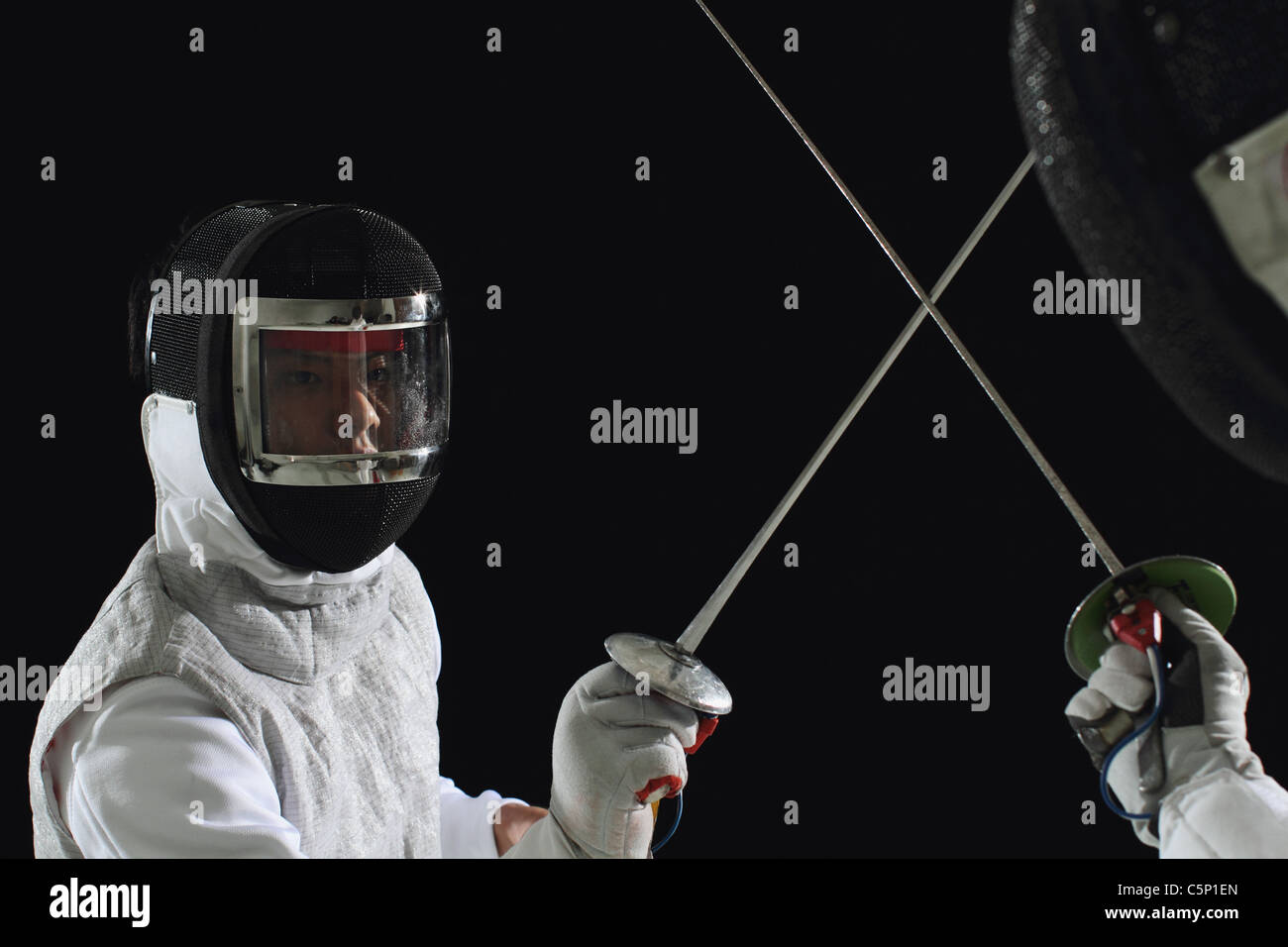 Fencing attack hi-res stock photography and images - Alamy