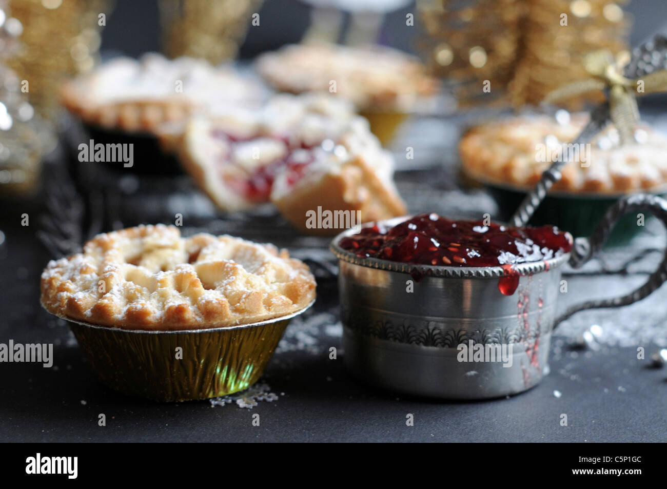 Small pastry filled with raspberry jam Stock Photo - Alamy