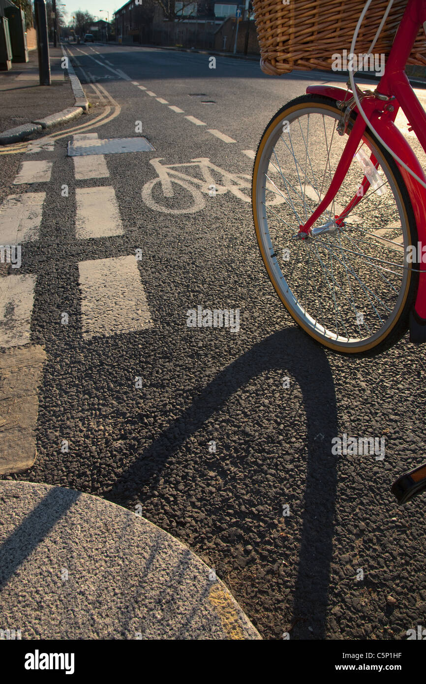 Road with cycle path and bicycle Stock Photo - Alamy