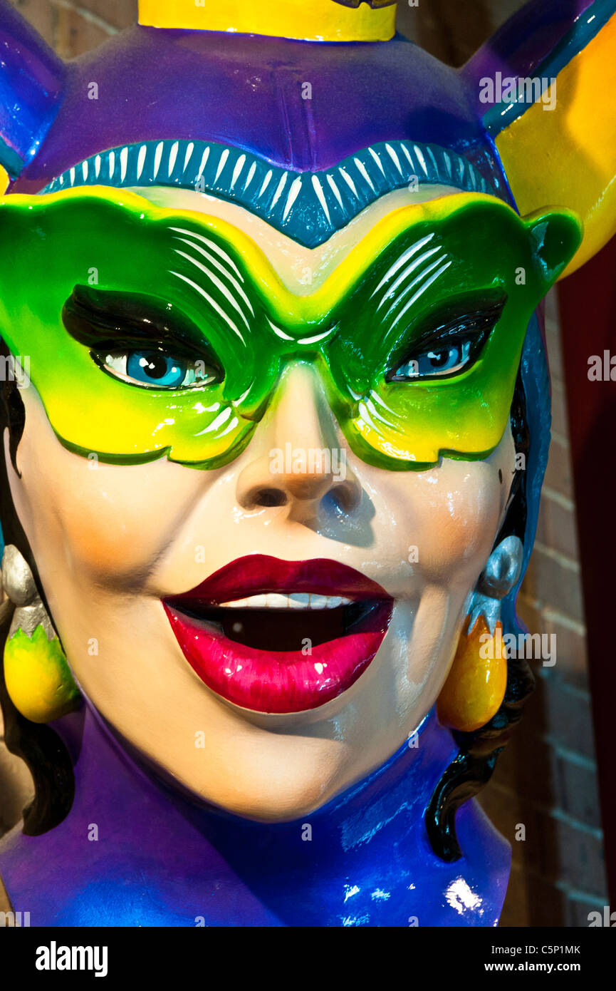 Detail of a statue wearing a Mardi Gras mask. New Orleans Stock Photo ...