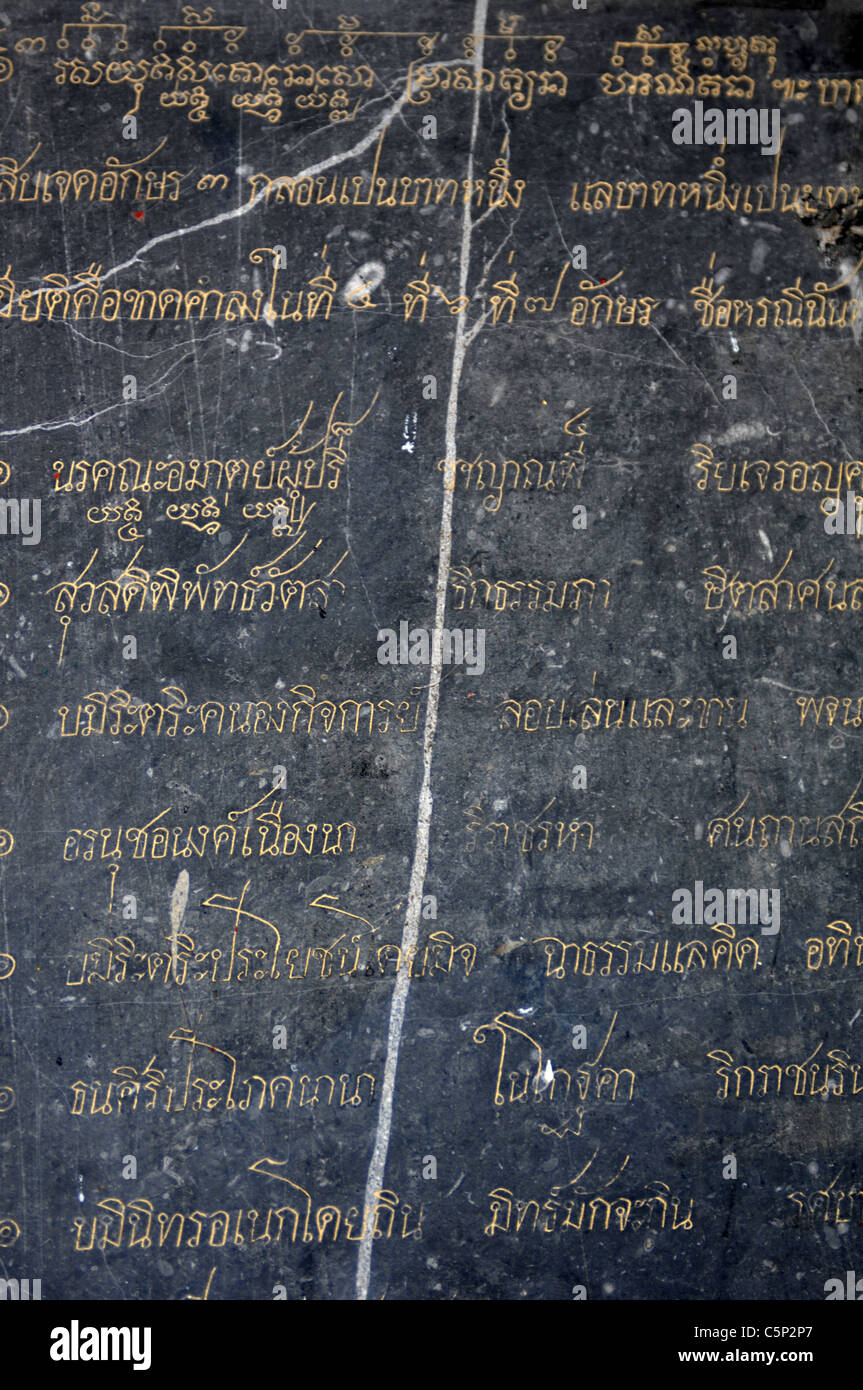 Ancient writing on slate tablet, Wat Arun Temple, Bangkok, Thailand ...