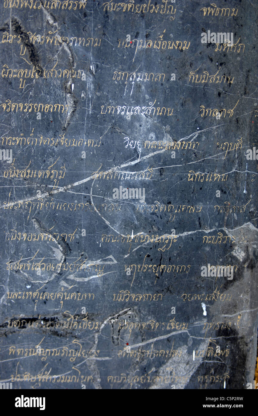 Ancient writing on slate tablet, Wat Arun Temple, Bangkok, Thailand ...