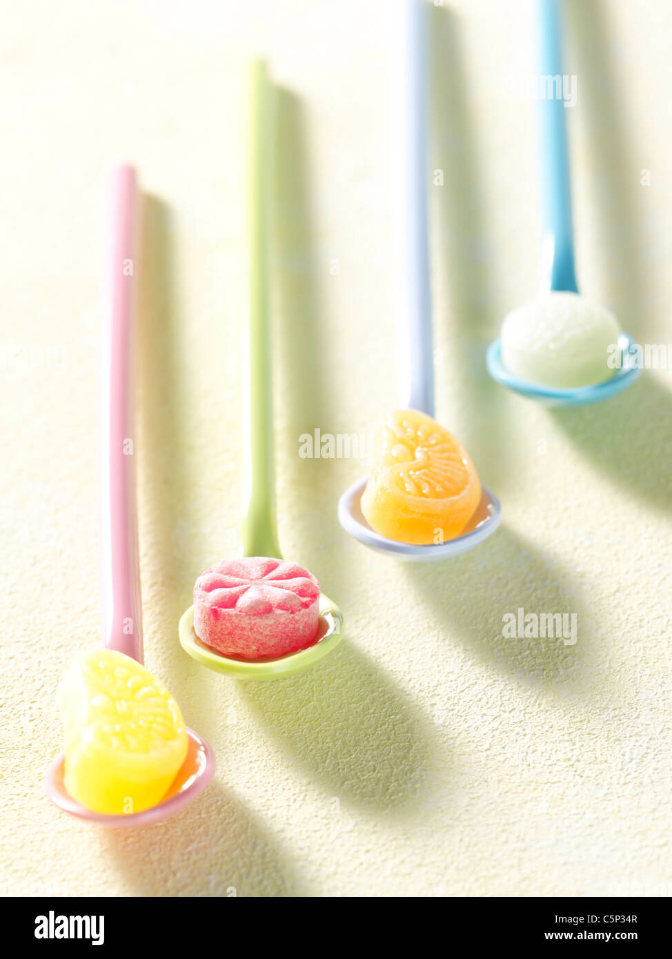 Mixed drops on spoons Stock Photo - Alamy