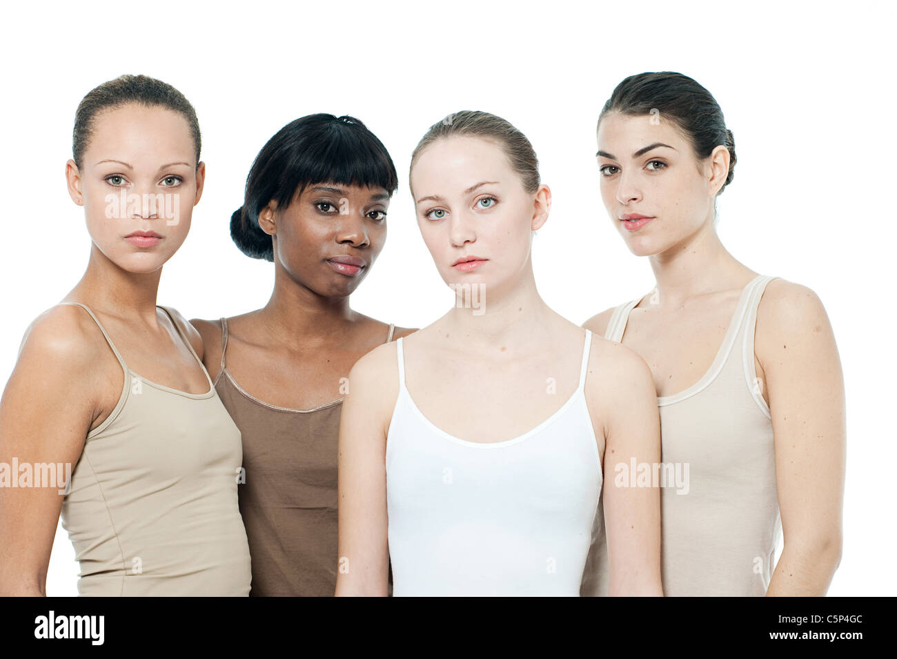 Four young women together Stock Photo - Alamy